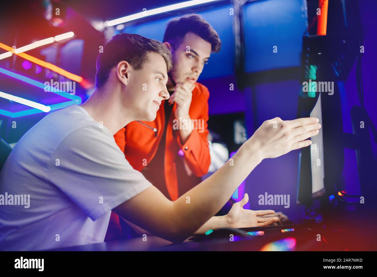 Two guys playing video games hi-res stock photography and images - Alamy