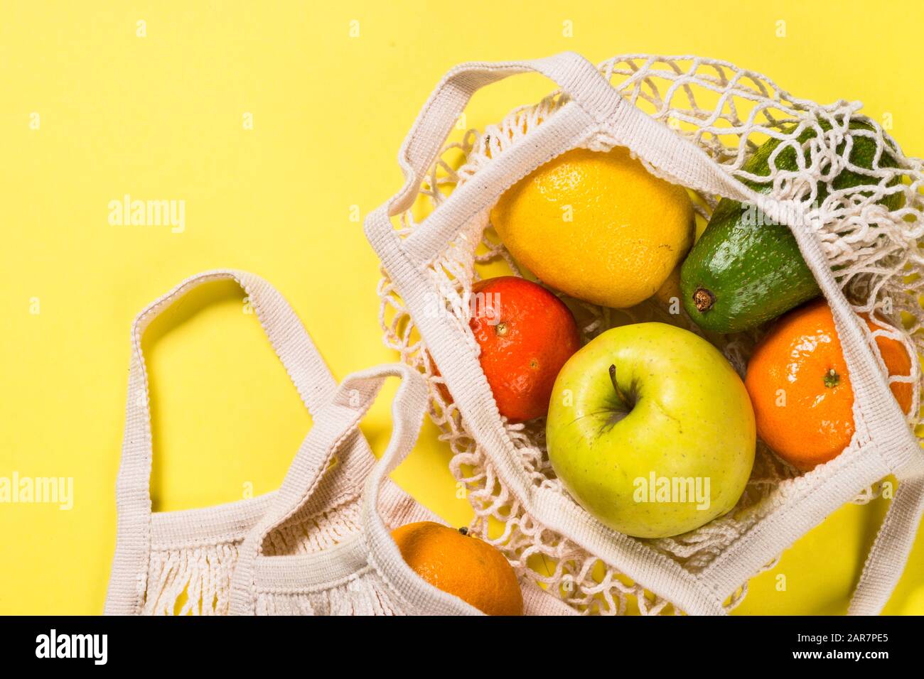 Yellow mesh bag of orange hi-res stock photography and images - Alamy