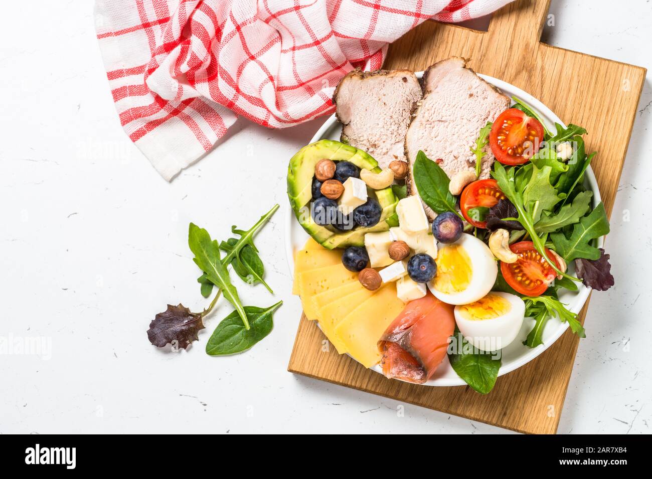 Keto diet plate on white table Stock Photo - Alamy