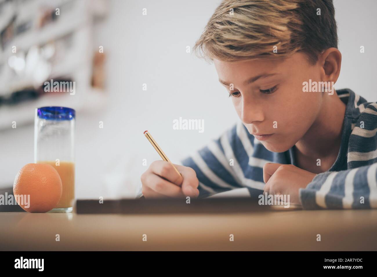 Teen Boy Writing Pen Home High Resolution Stock Photography and Images ...