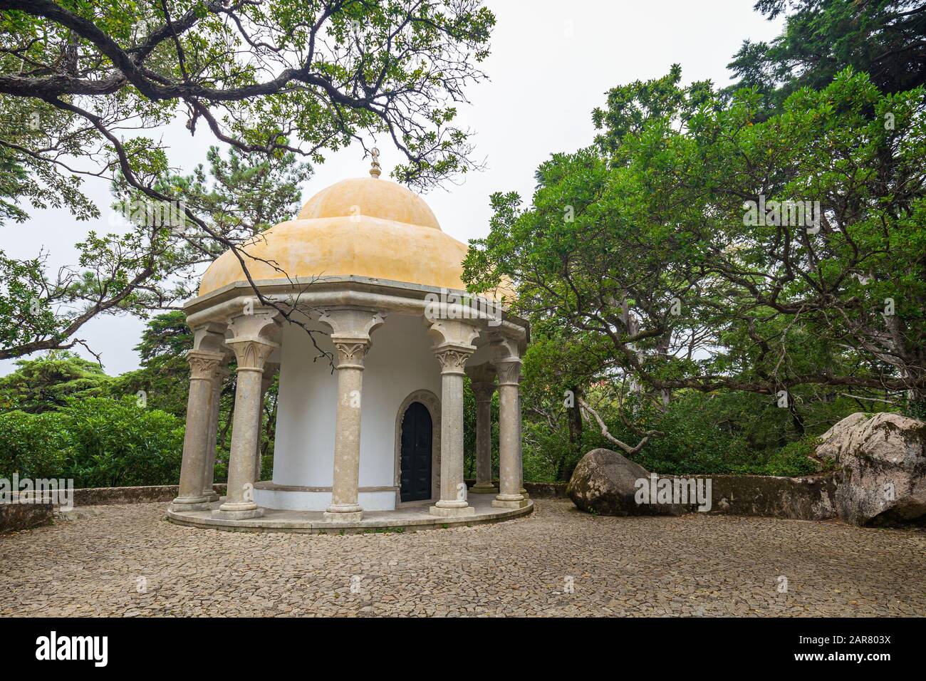Temple of Columns, an old and small temple in lush and verdant natural ...