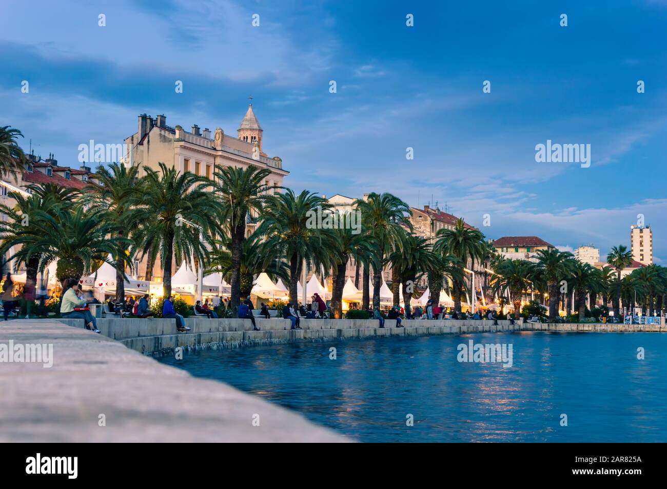 Split, Croatia - May 21, 2019: Riva Promenade with palm trees, lights ...