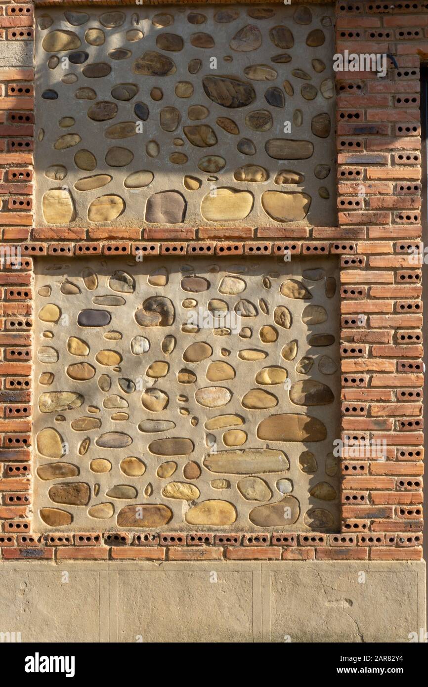 Pebble and brick wall Stock Photo - Alamy