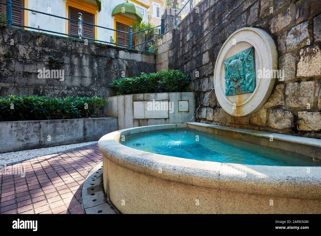 Source of natural spring water on historic Lilau Square (Largo do Lilau ...