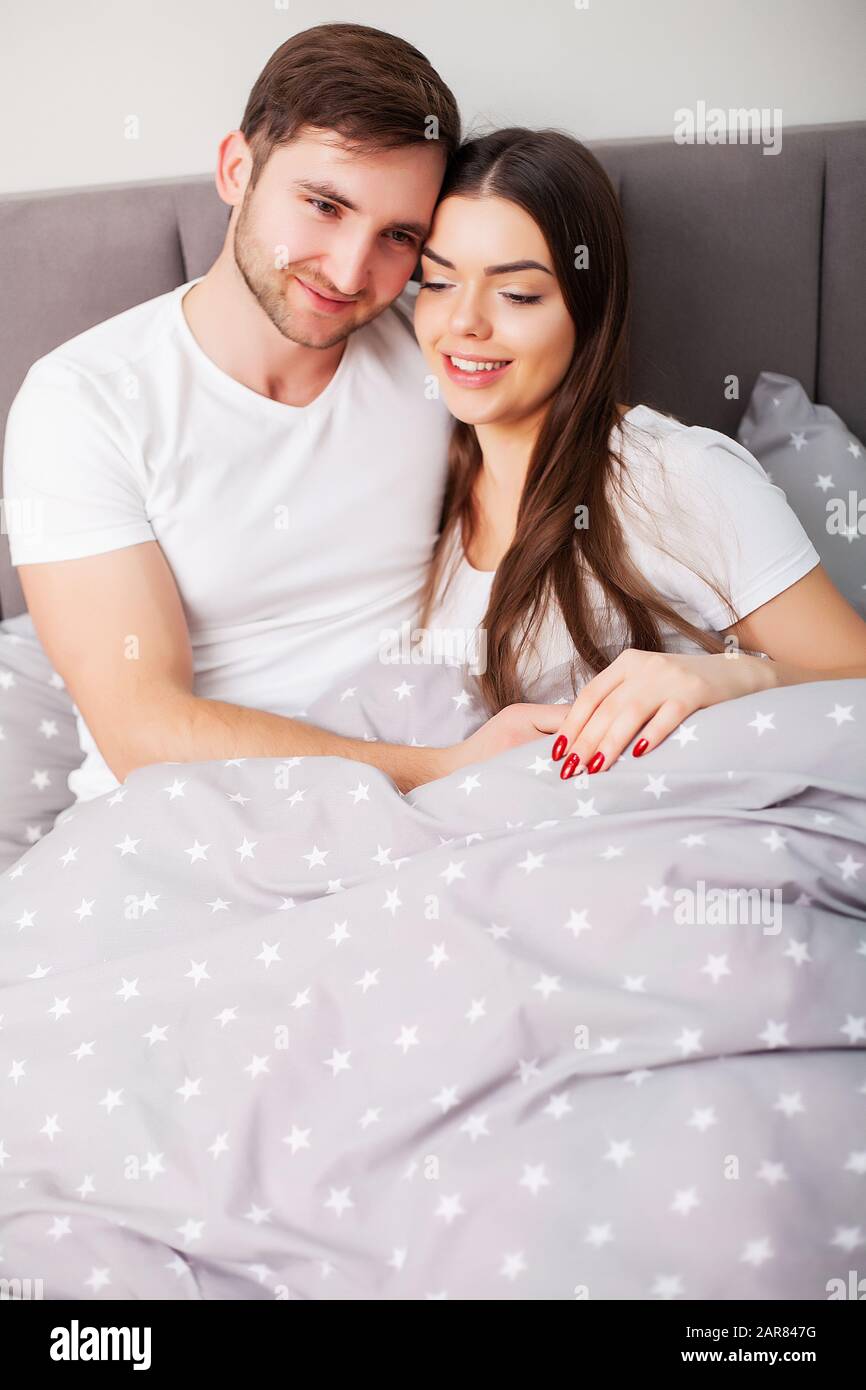 Happy Couple Having Fun In Bed Intimate Sensual Young Couple In