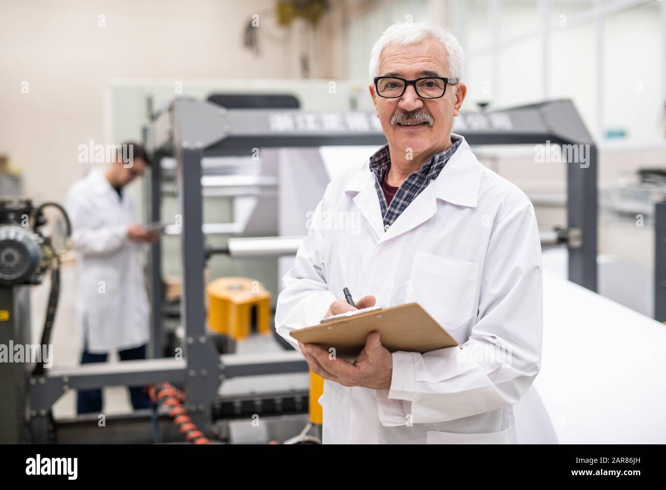 Quality inspector hi-res stock photography and images - Alamy