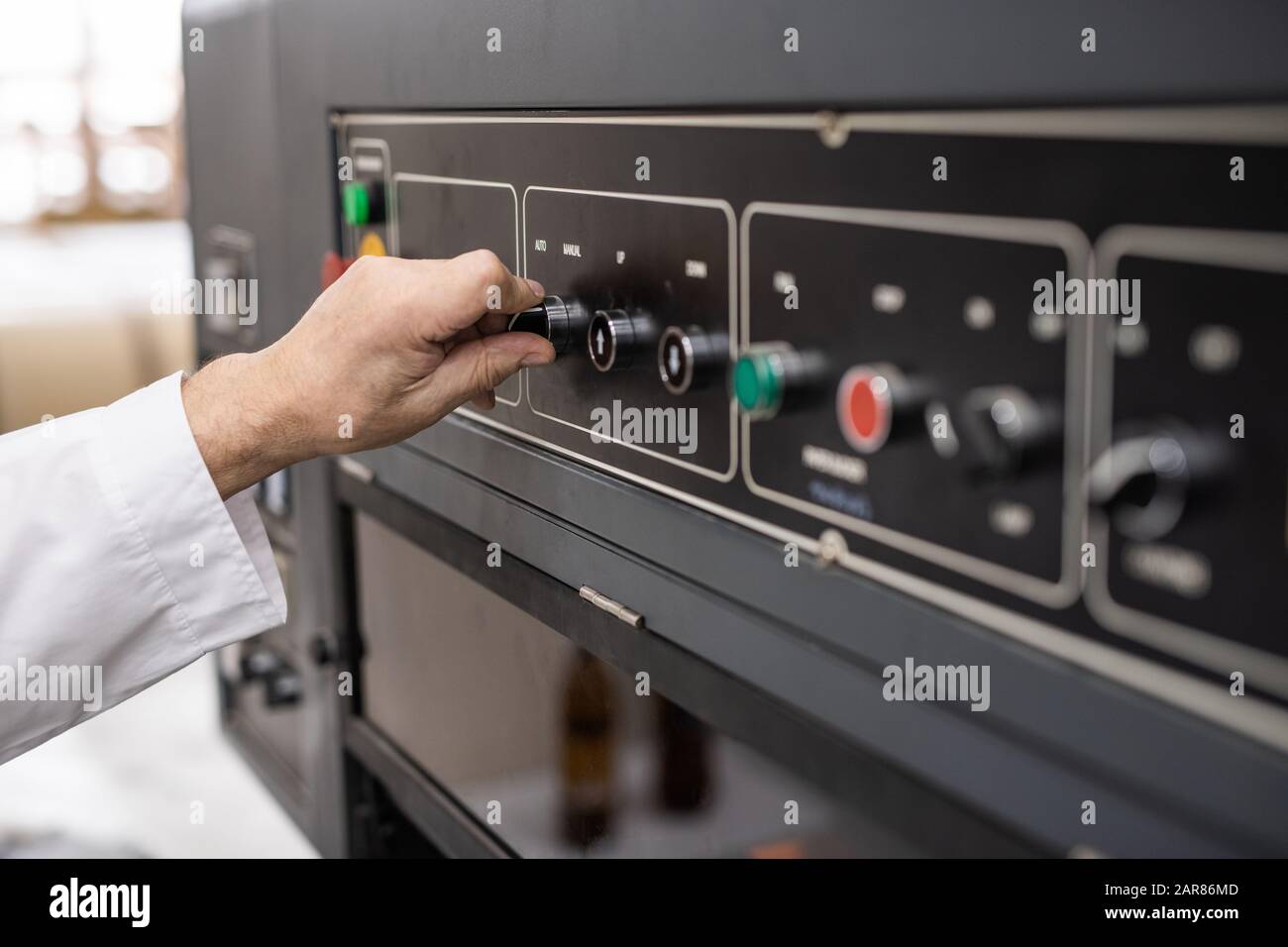 Twisting knob of control panel Stock Photo - Alamy