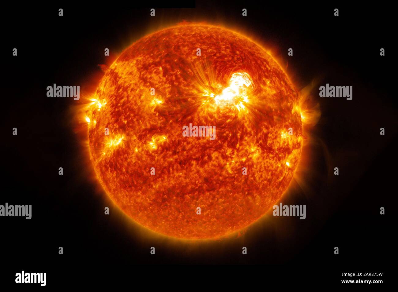 The sun, a hot star, completely. On a dark background. Elements of this ...