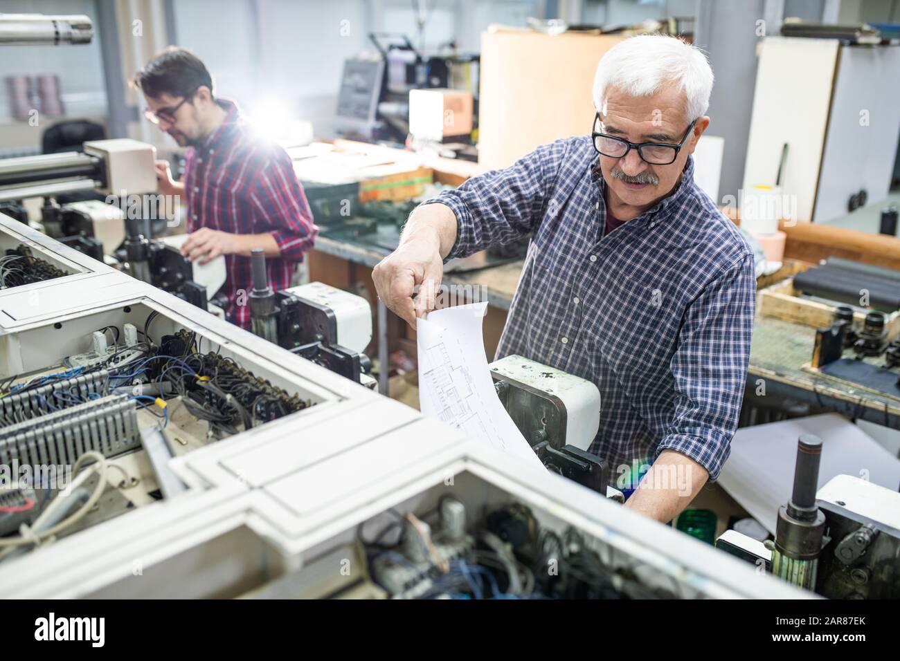 Paper making skill hi-res stock photography and images - Alamy