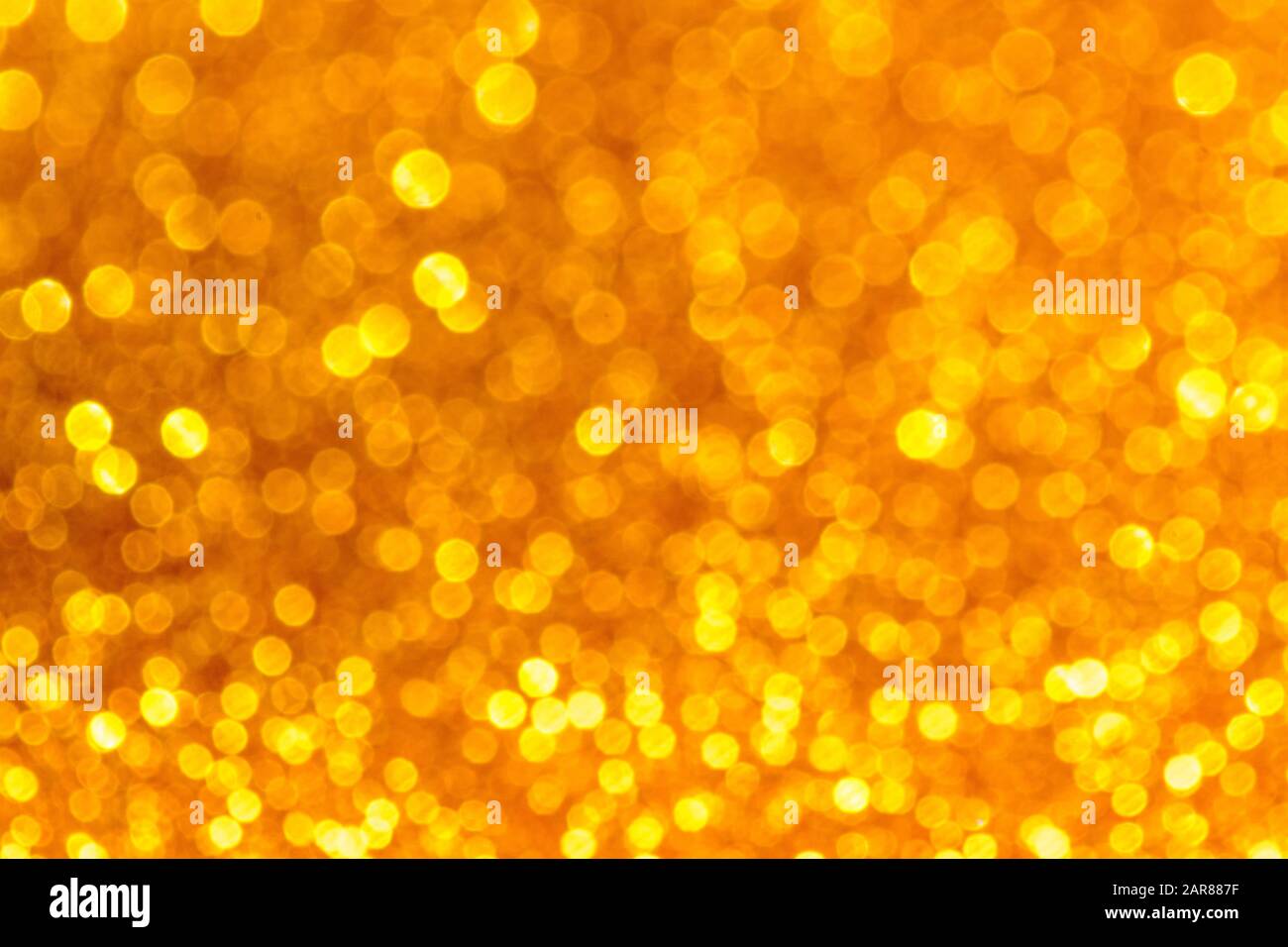 Christmas gold color shiny abstract background, flat lay, soft focus ...