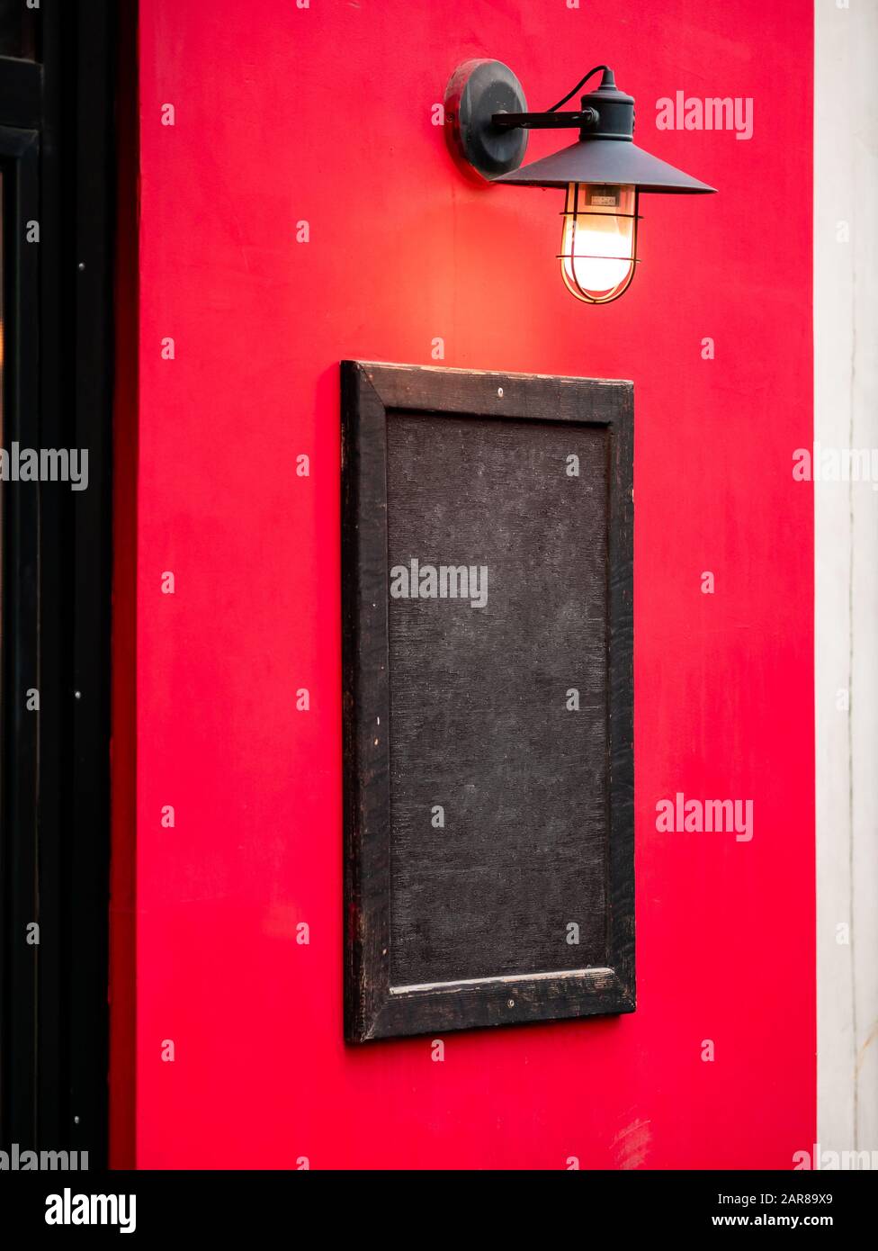 Rectangular real wooden painted sign with lighting from above ...