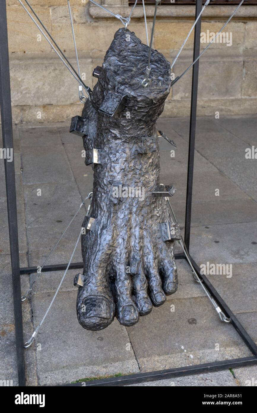 Sculpture of a bronze foot in Santiago de Compostela Stock Photo - Alamy
