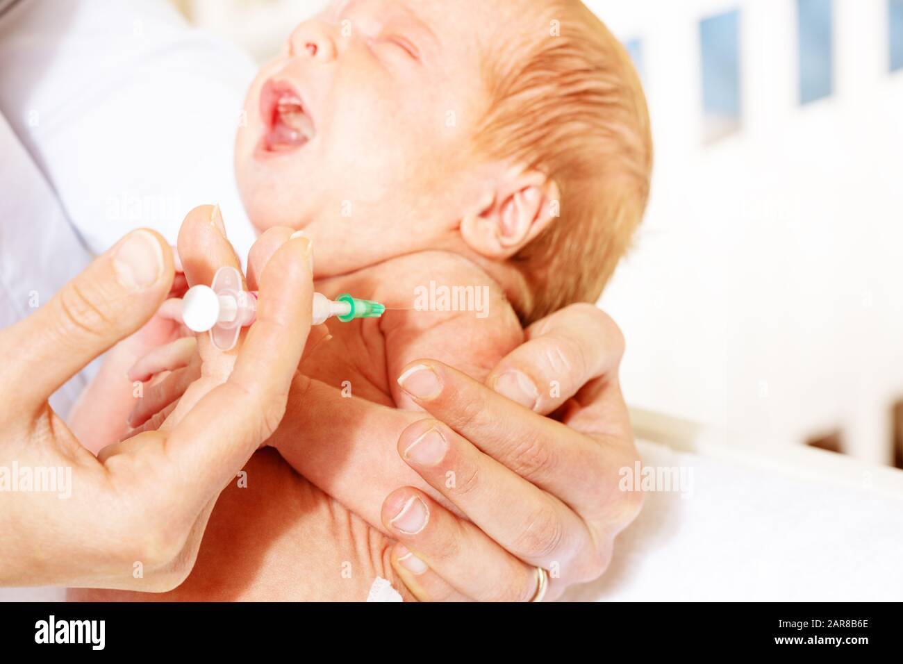 Baby injection cry hi-res stock photography and images - Alamy