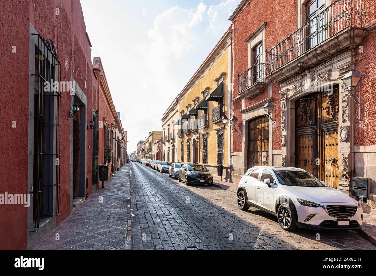 View of the Old buildings down Hidalgo street, in the Mexican city of ...