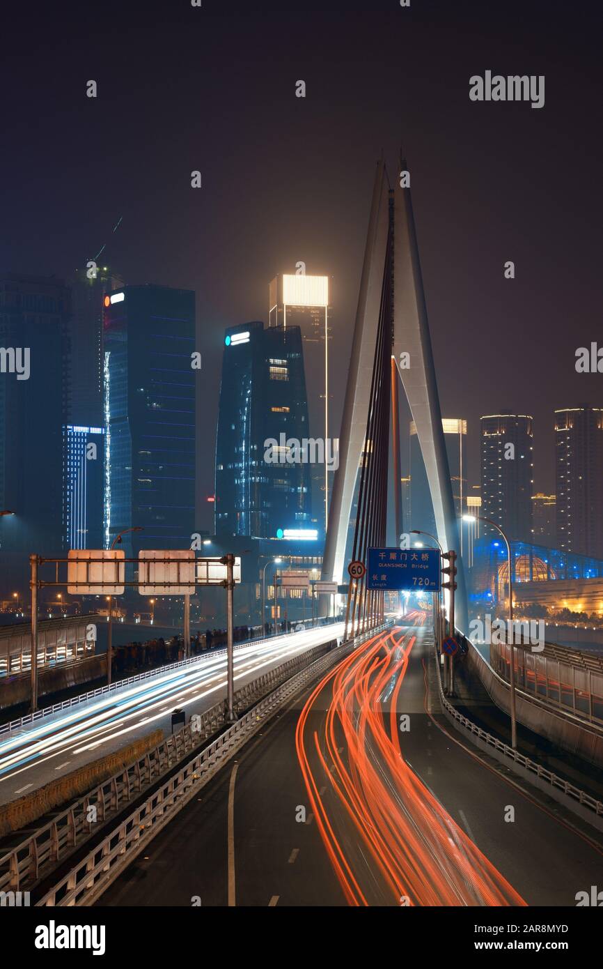 Bridge and light trail at night in Chongqing, China Stock Photo - Alamy