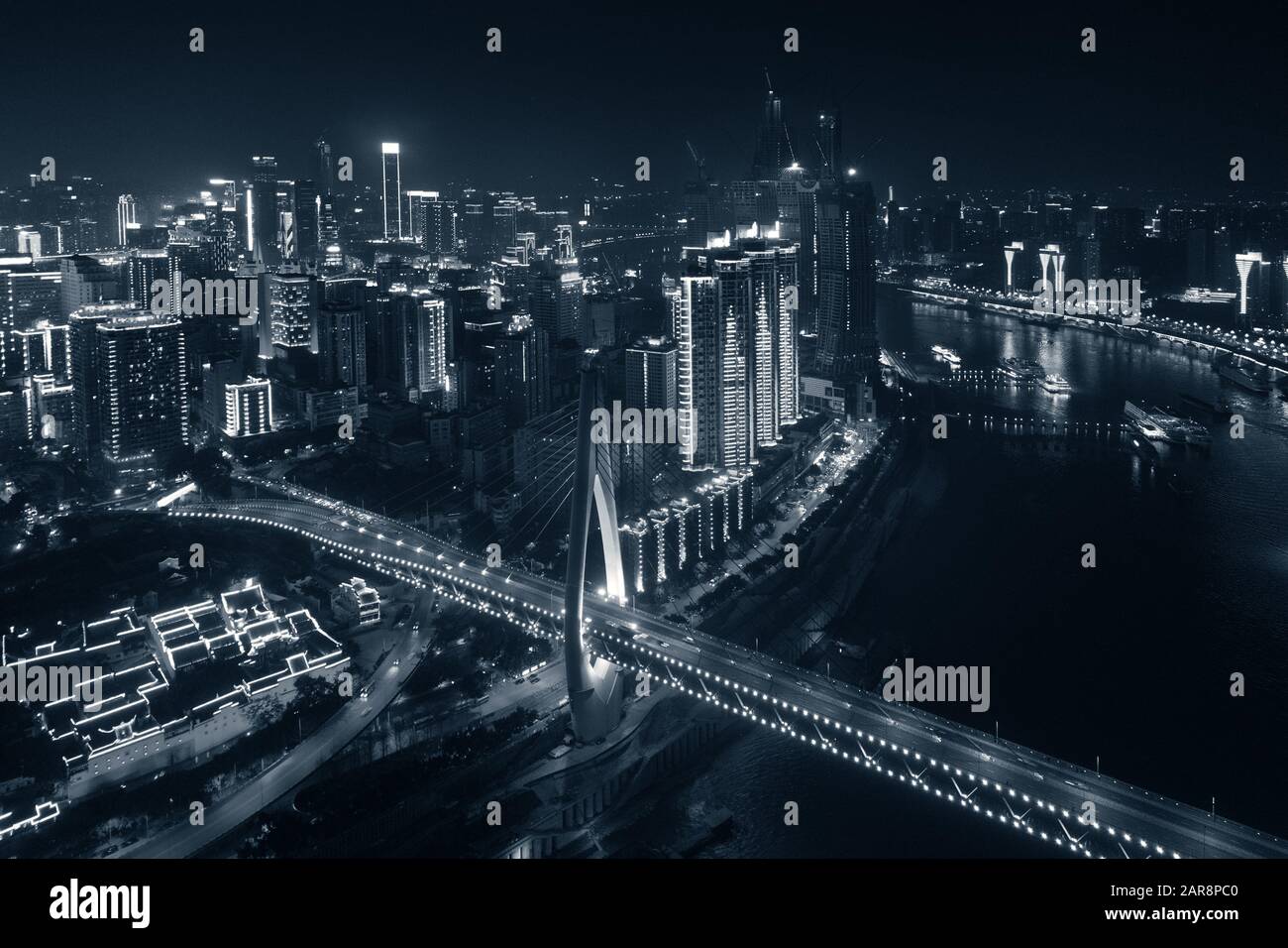 Aerial view of Bridge and city urban architecture at night in Chongqing ...