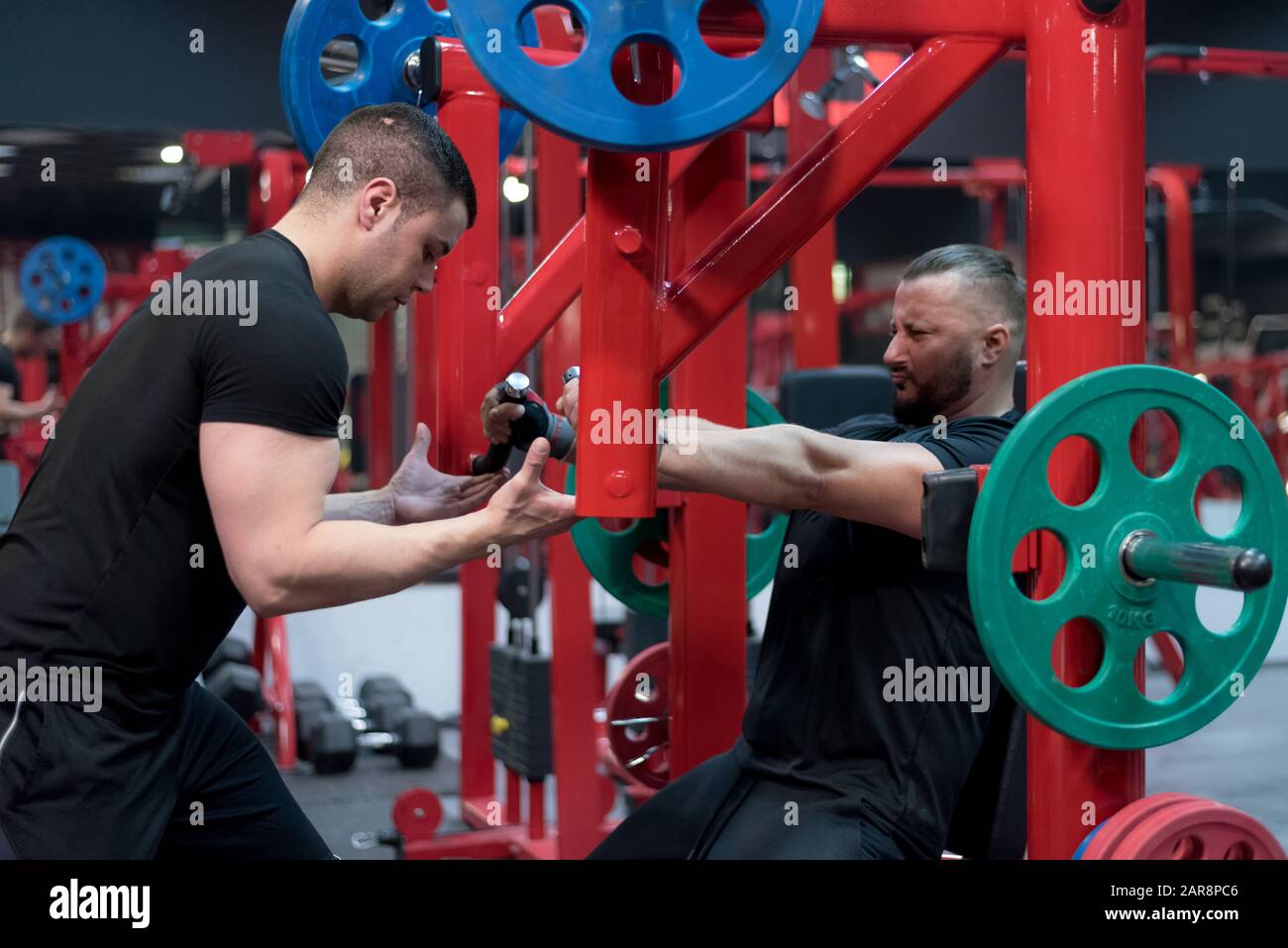 Bodybuilding Motivation. Two Bodybuilders Train Together at the Gym ...