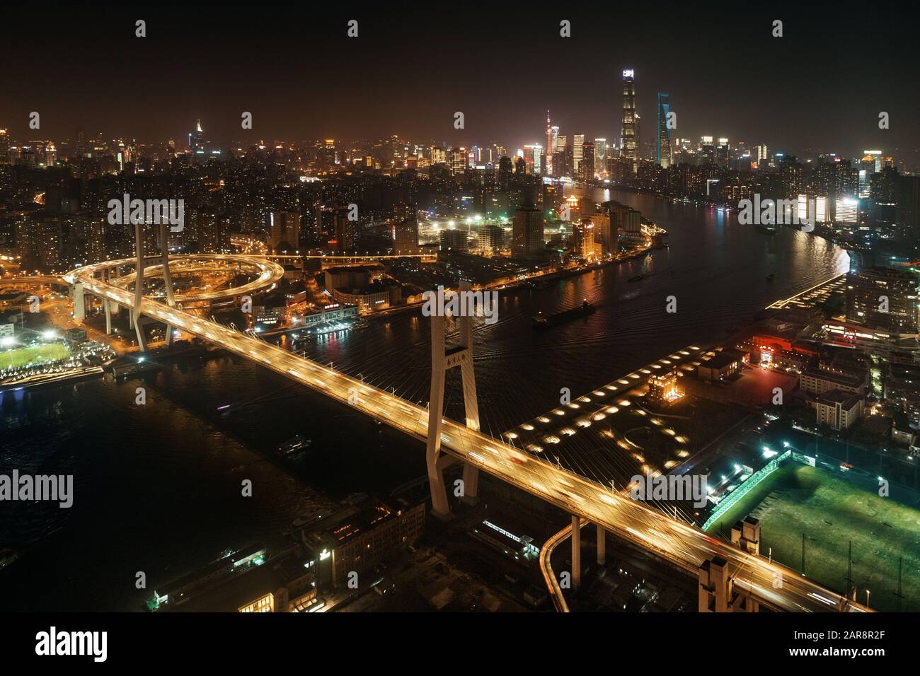Shanghai Nanpu Bridge over Huangpu River with busy traffic in China ...