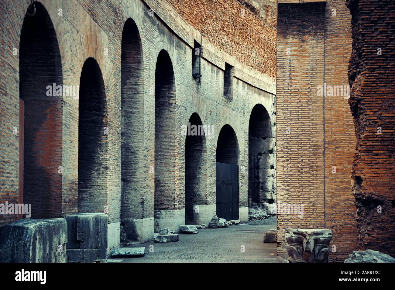 Archway in Colosseum, the world known landmark and the symbol of Rome ...