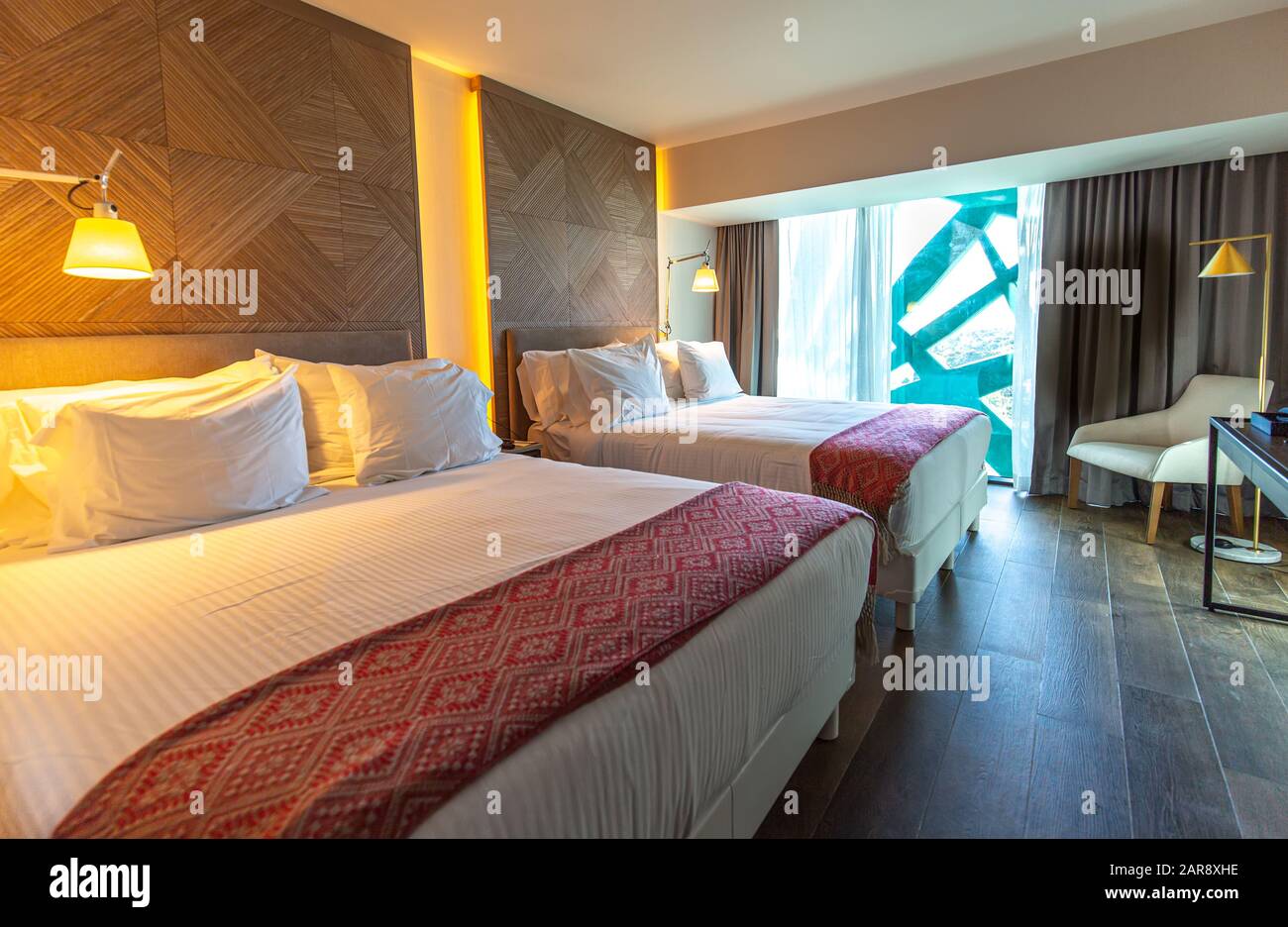 Merida, Mexico - 10 December, 2019: An upscale room in NH Collection ...