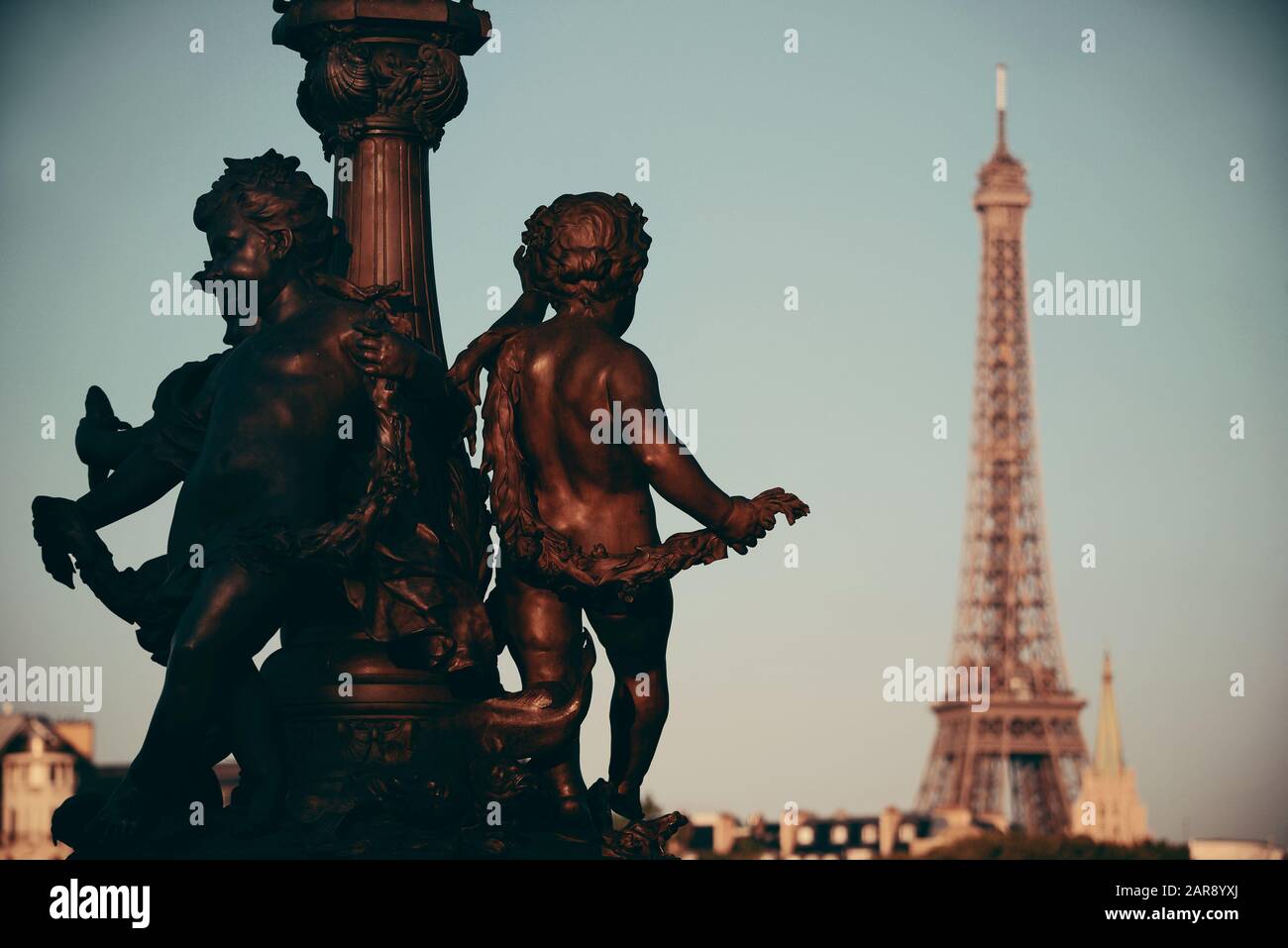 Alexandre III bridge, statue and Eiffel tower in Paris, France Stock ...