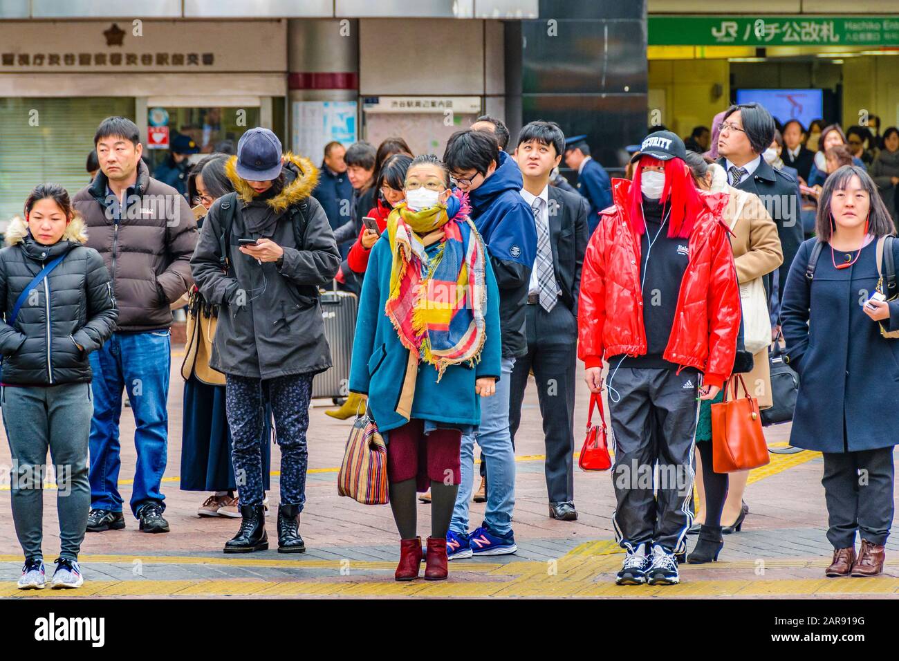 TOKYO, JAPAN, JANUARY - 2019 - People waiting to cross at famous ...