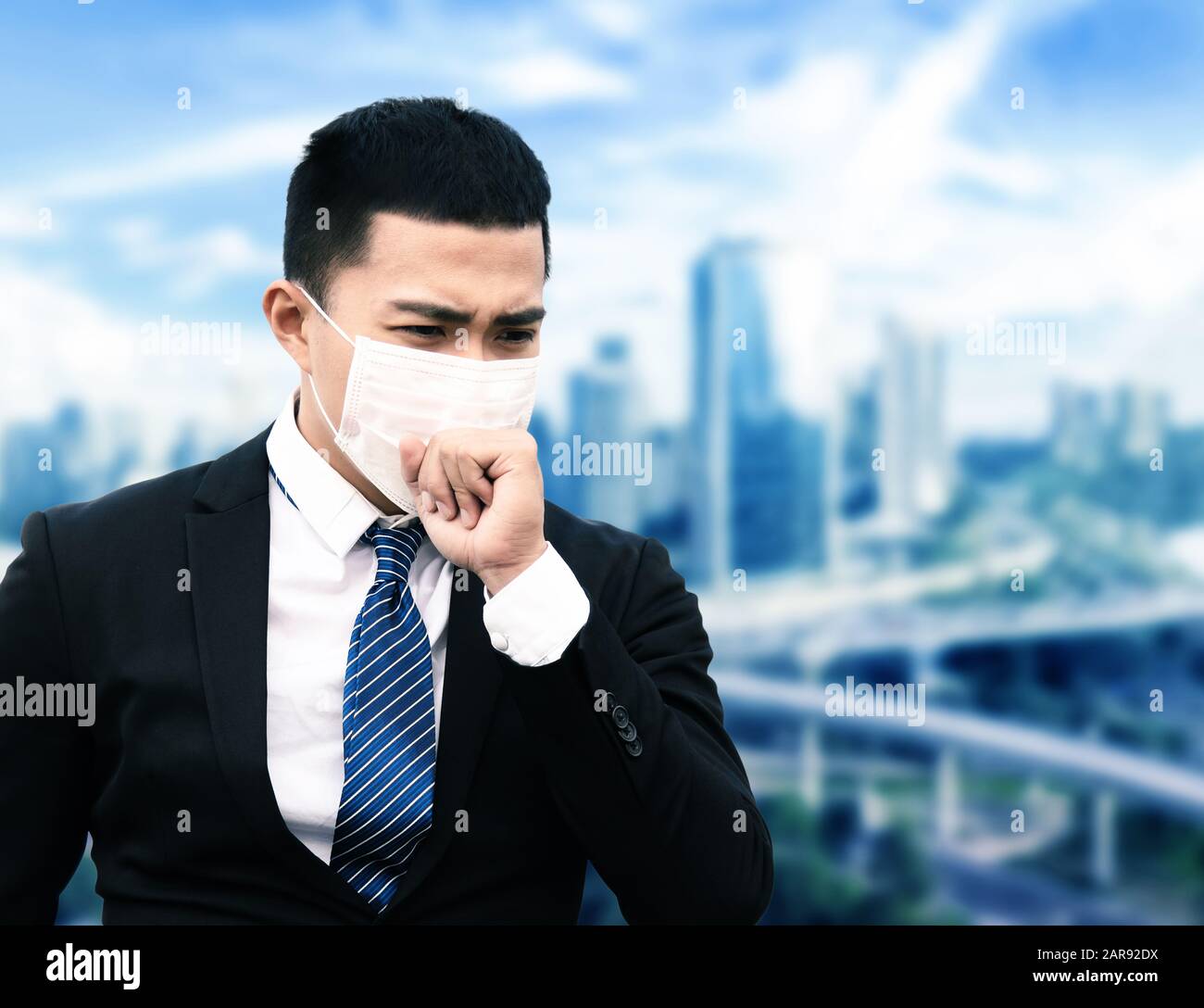 Asian business man suffer from cough with face mask protection Stock ...