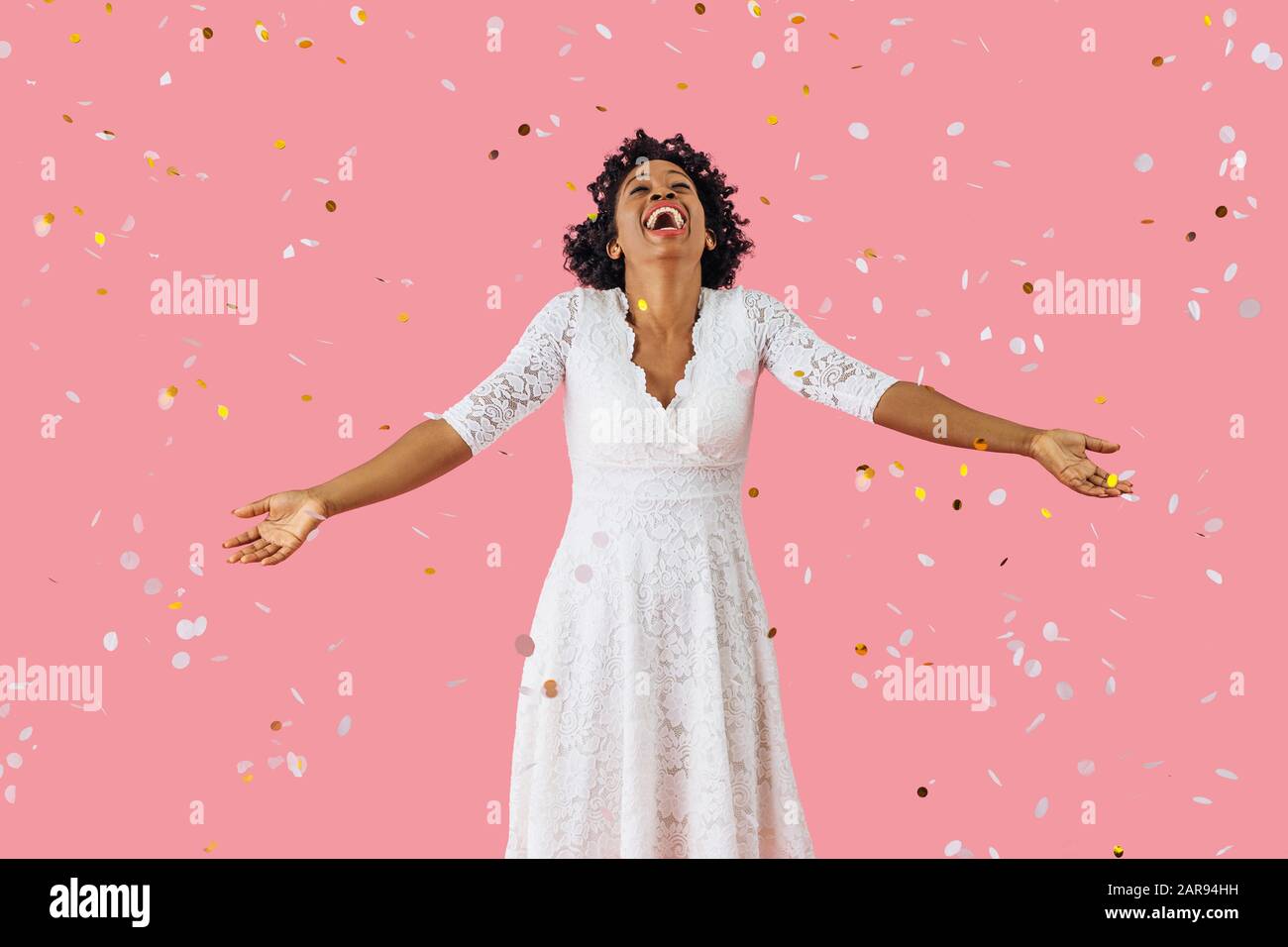 Portrait of excitement and happiness, happy young woman in white dress ...