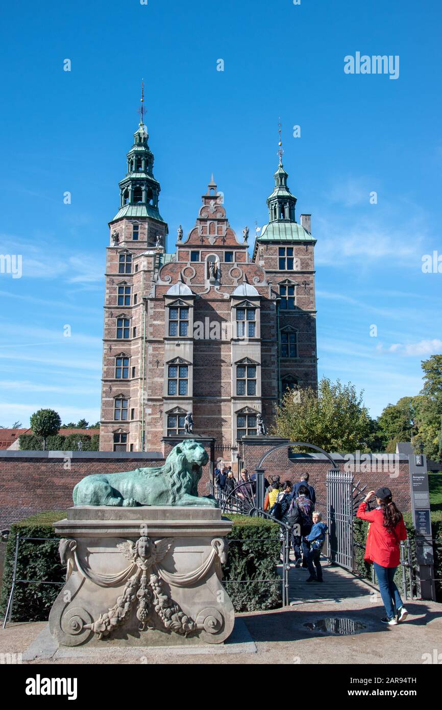 Lion statue guarding the gate from the Kings gardens. Rosenborg Castle ...