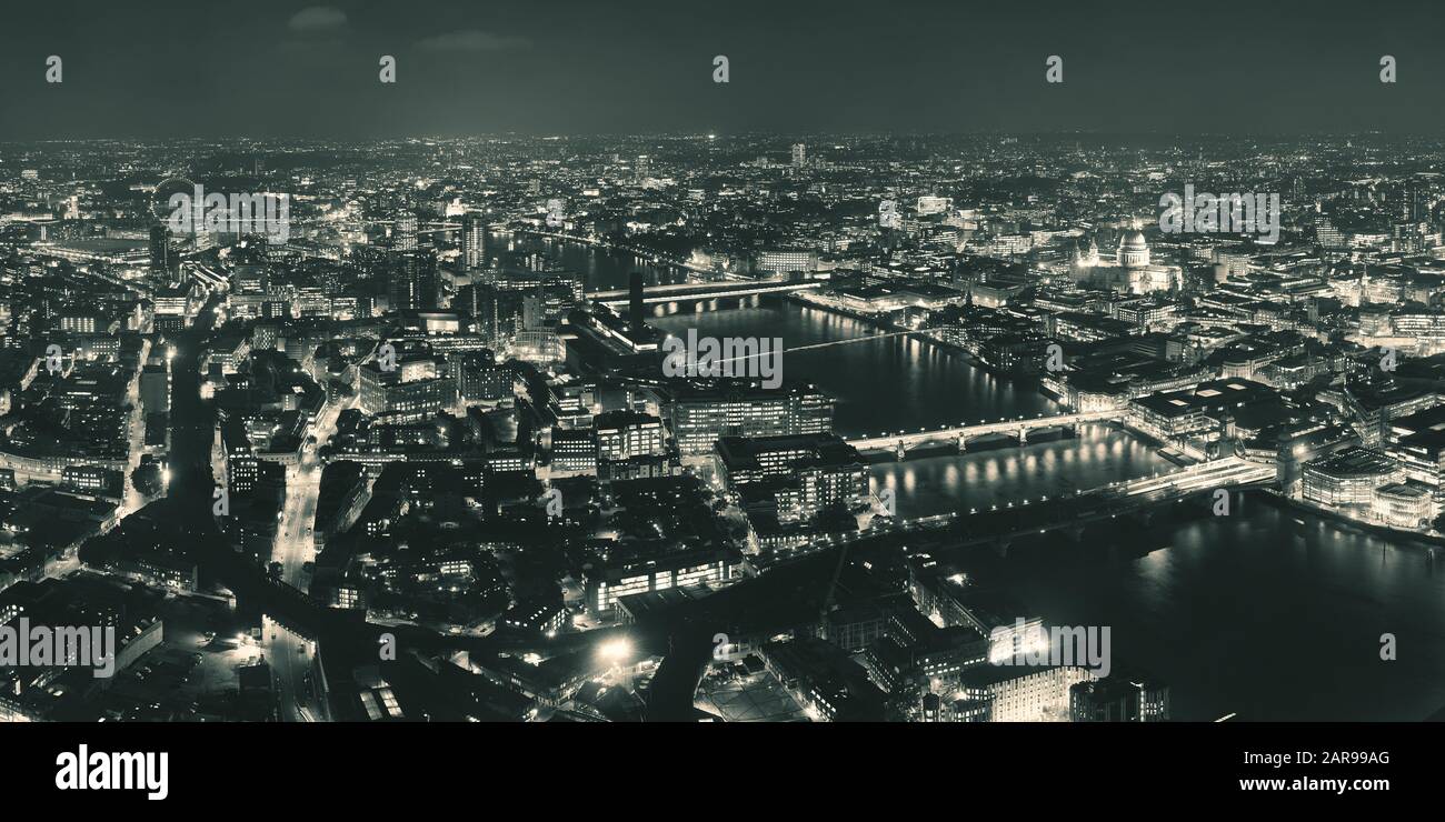 London aerial view panorama at night with urban architectures and ...