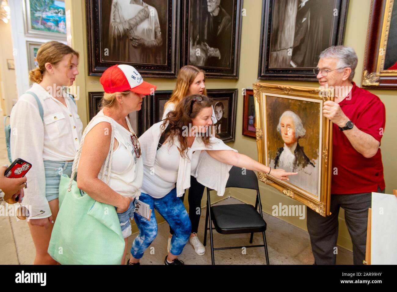 At a Laguna Beach, CA, art gallery, an artist displays his copy of ...
