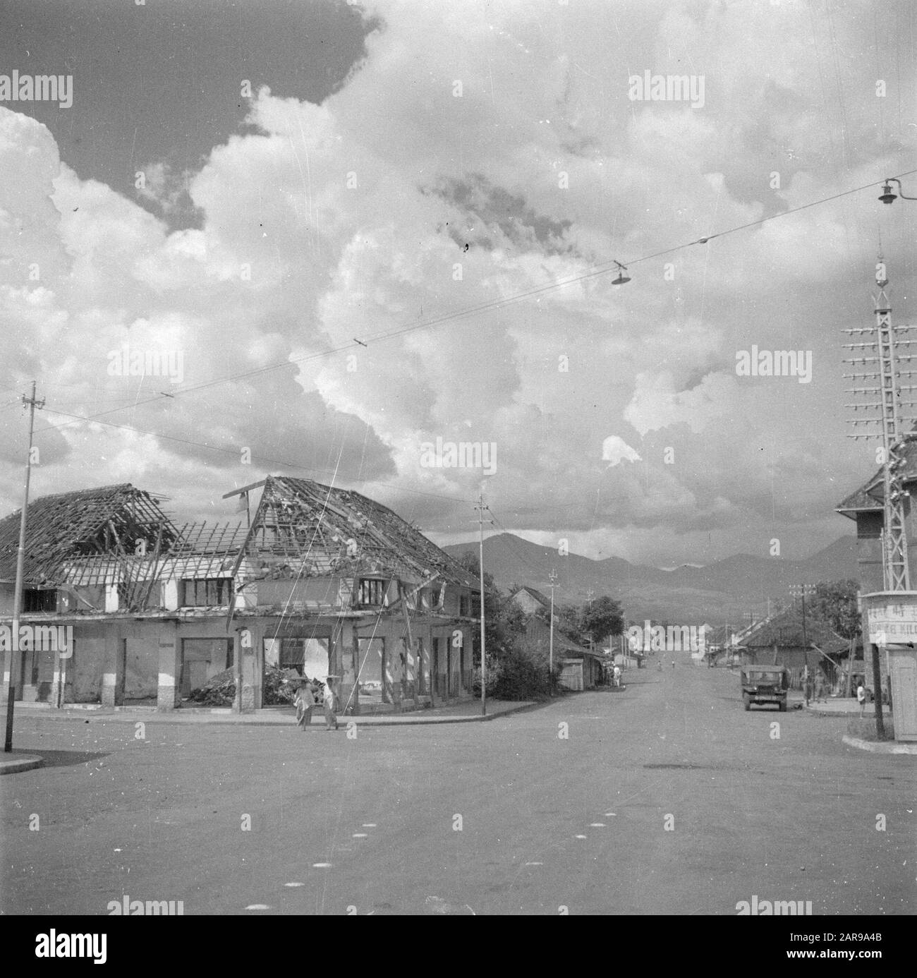War volunteers in Malacca and Indonesia Destroyed houses in Bandoeng ...