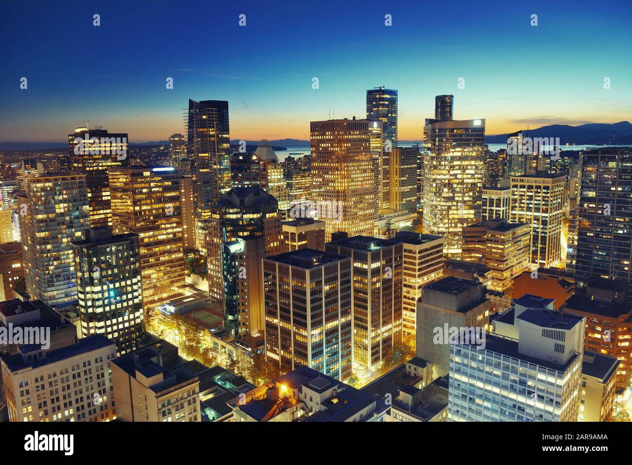 Vancouver rooftop view with urban architectures at dusk Stock Photo - Alamy