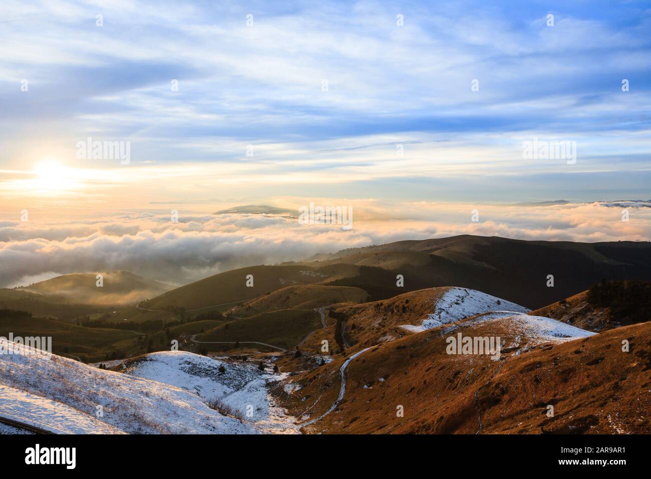 Mount Grappa landscape, Italian alps, Italy. Sunset on clouds Stock ...
