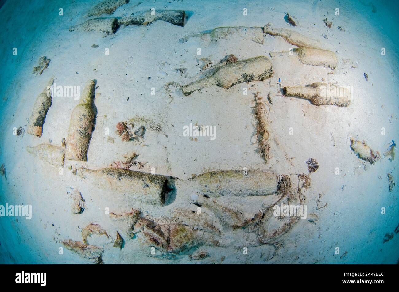 Bottles on sand by Cross wreck, Cross Wreck dive site, Manokwari ...