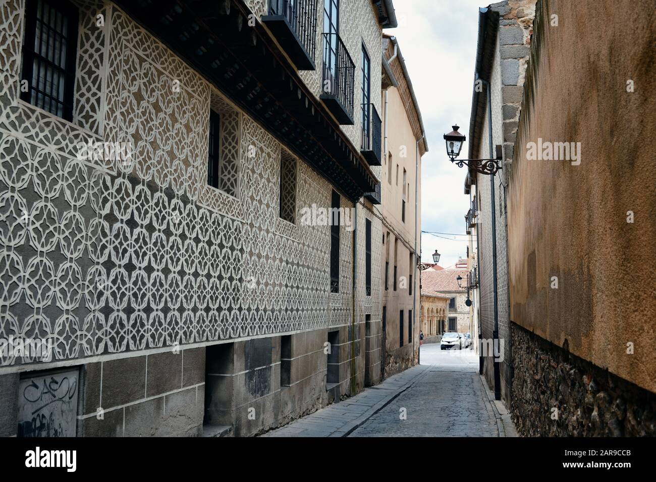 Segovia alley with old buildings street view in Spain Stock Photo - Alamy