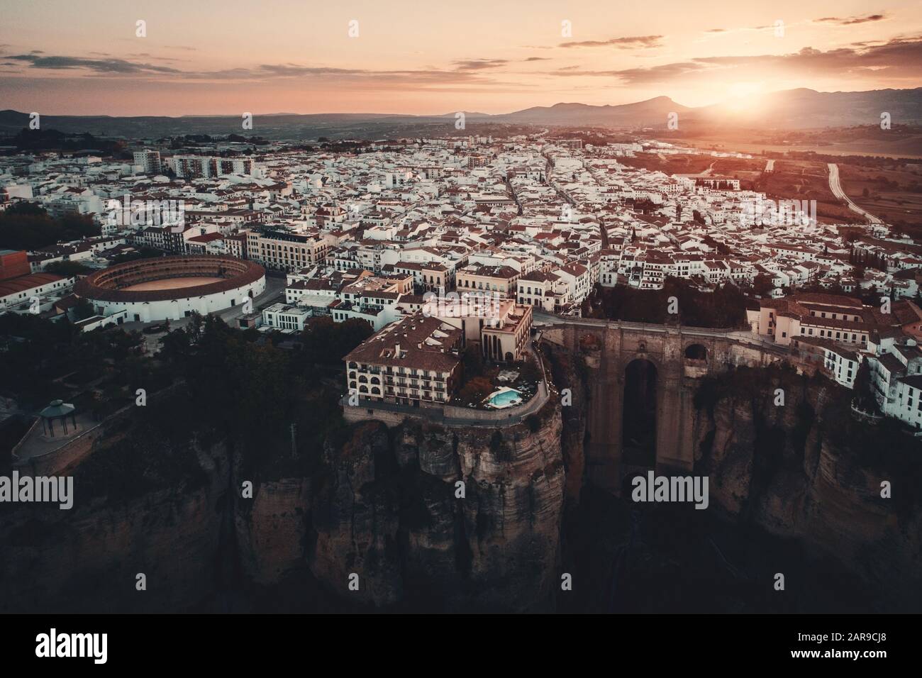 Ronda aerial view at sunrise with old buildings in Spain Stock Photo ...