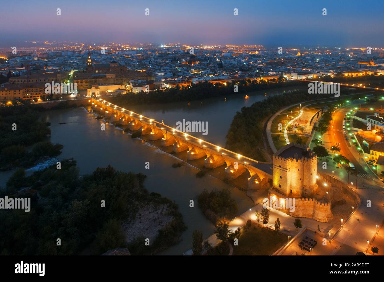 City ancient architecture of Cordoba viewed from air at night in Spain ...