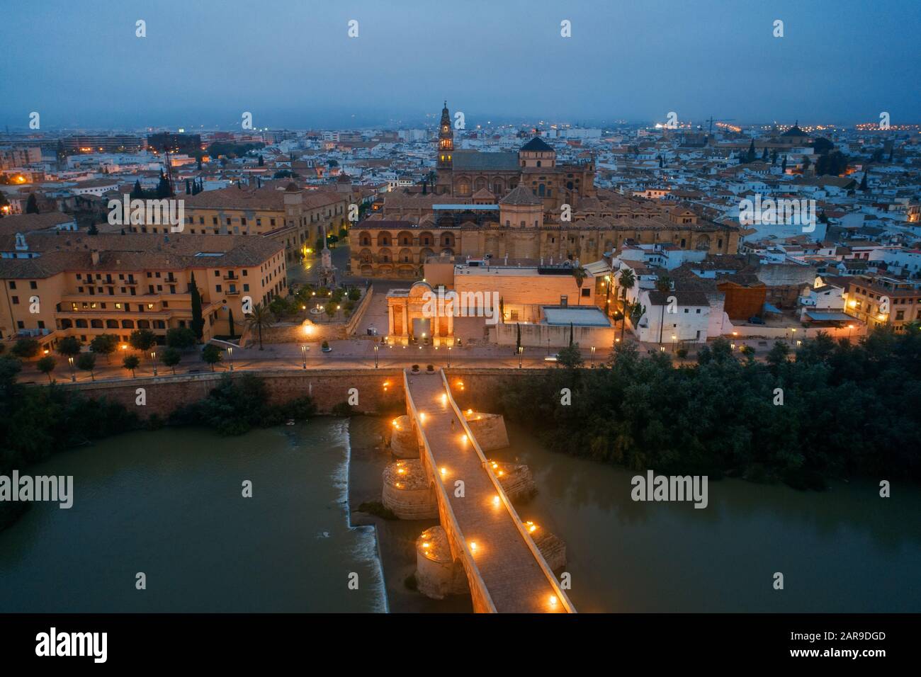 City ancient architecture of Cordoba viewed from air at night in Spain ...