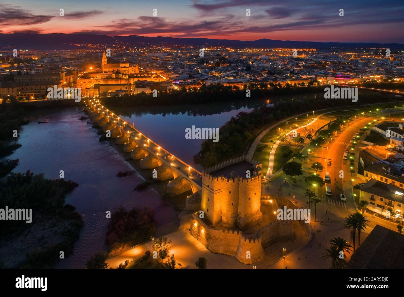 City ancient architecture of Cordoba viewed from air at night in Spain ...