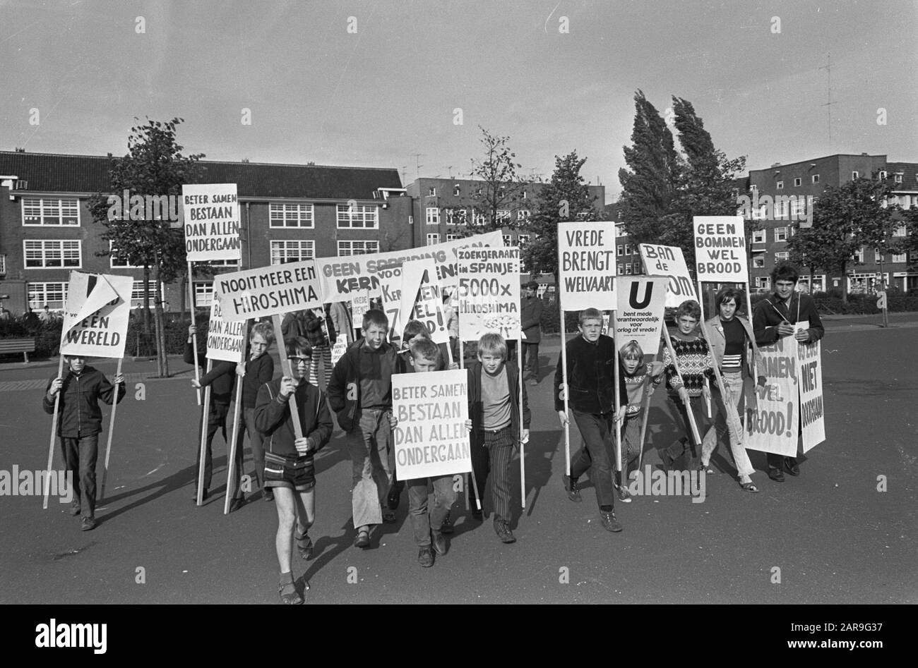 Peace march in the Indian neighbourhood in Amsterdam. Front children ...
