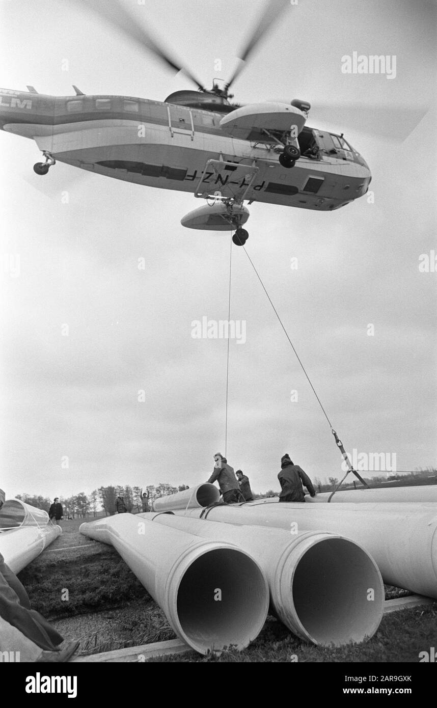 Water pipes by helicopter laid at Woerden Date: 9 November 1976 ...