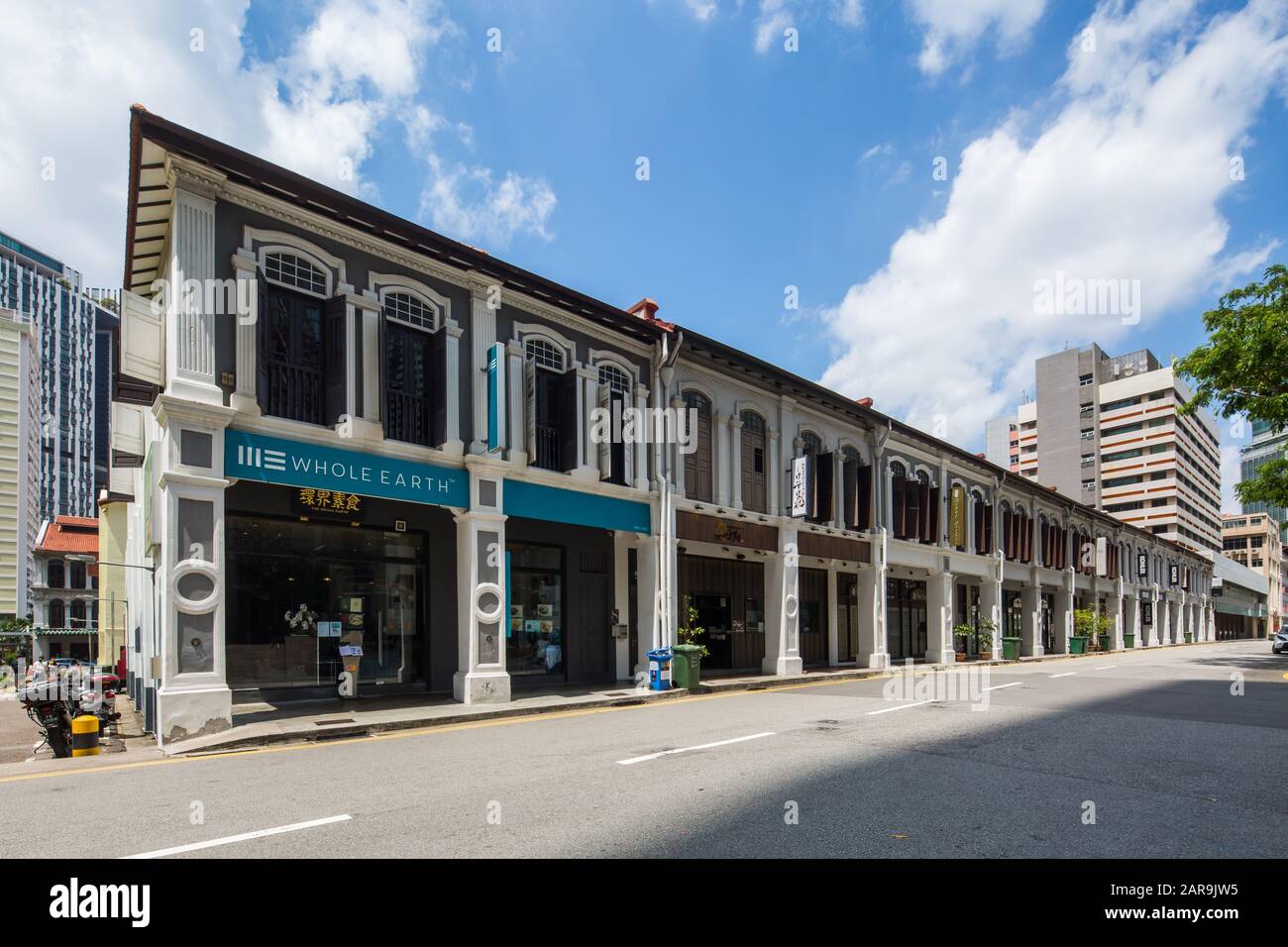 A long row of two levels shophouse along Peck Seah Street, Singapore ...