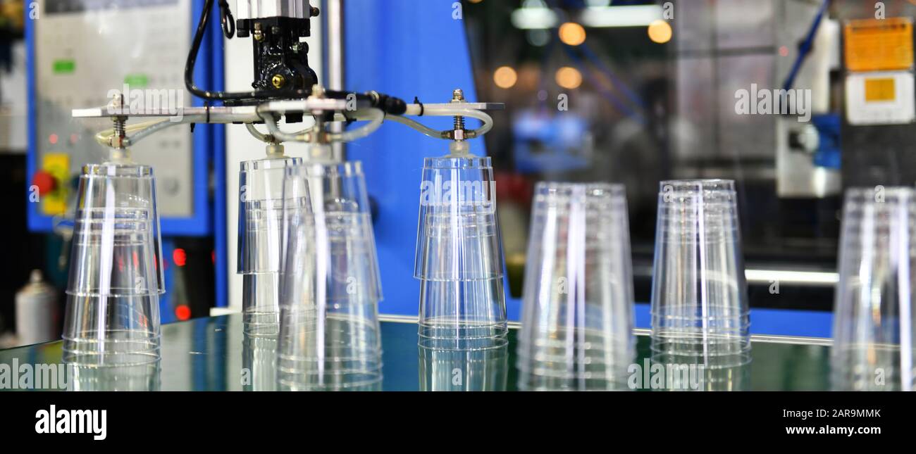 Clear Plastic glass transfer on Automated conveyor systems industrial ...