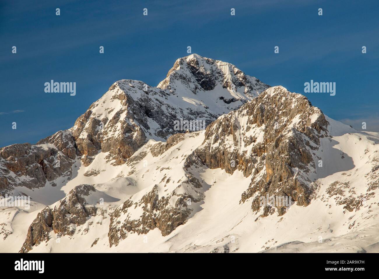 Triglav mountain covered in snow Stock Photo - Alamy