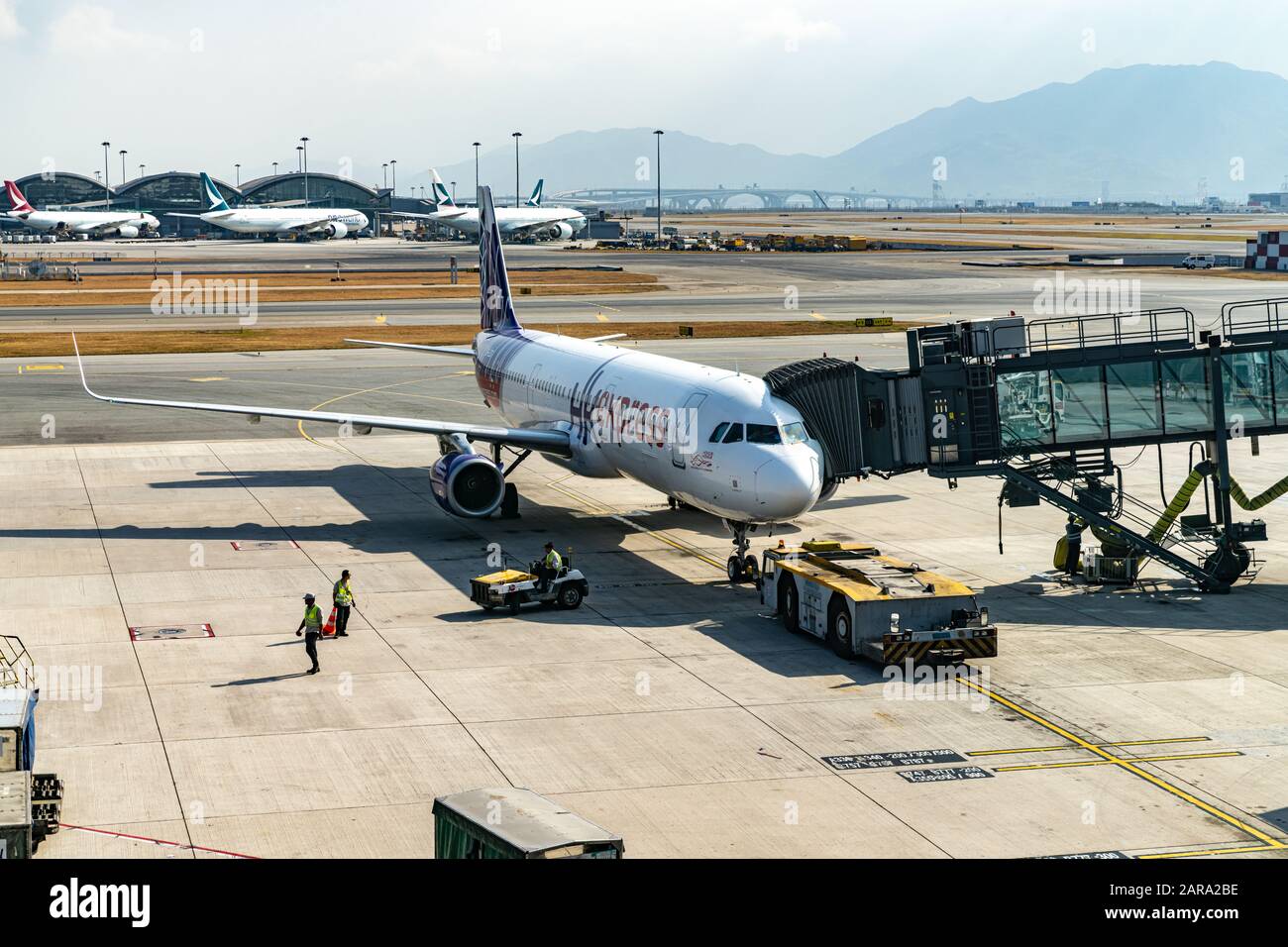 Lantau, Hong Kong - November 16, 2019 : Airplane dock with passenger ...