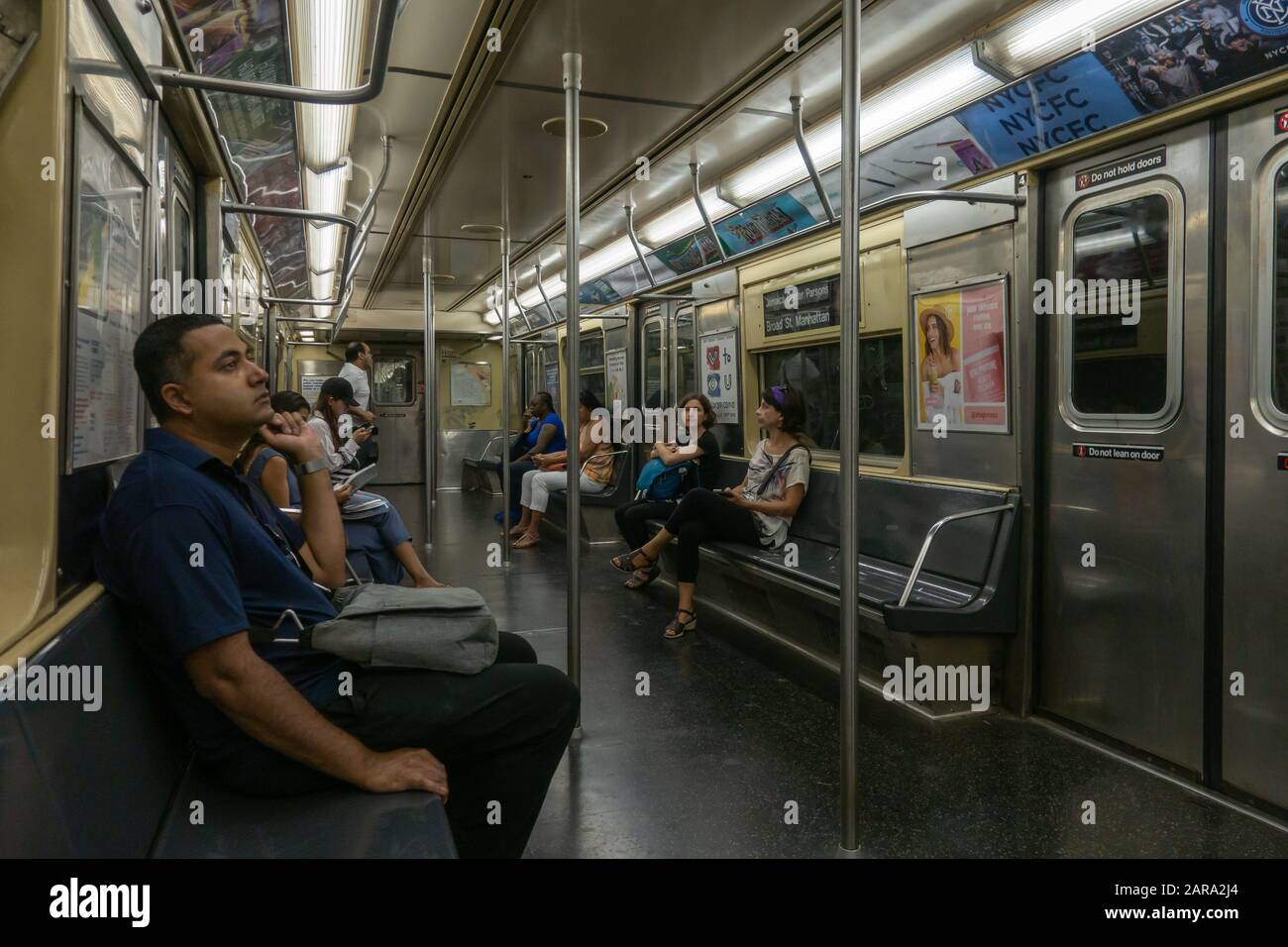 Passengers inside new york city subway hi-res stock photography and ...