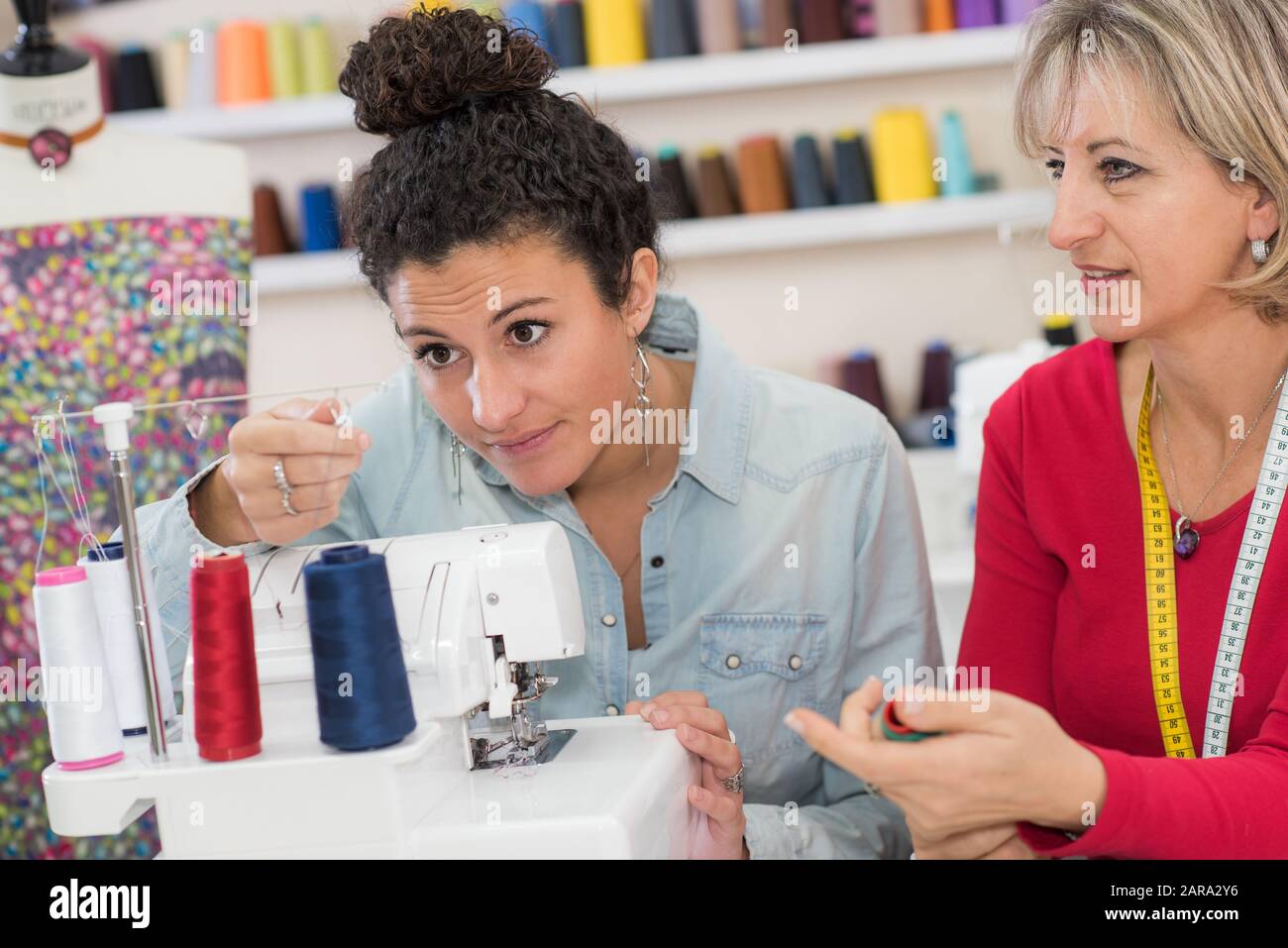 portrait of women during sewing process Stock Photo - Alamy