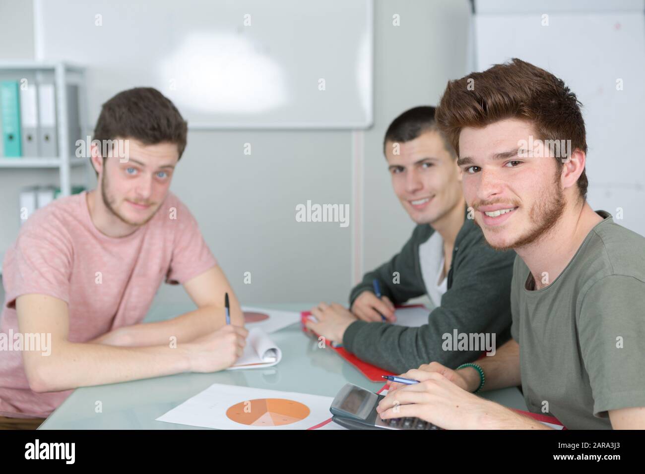 an university student working together Stock Photo - Alamy