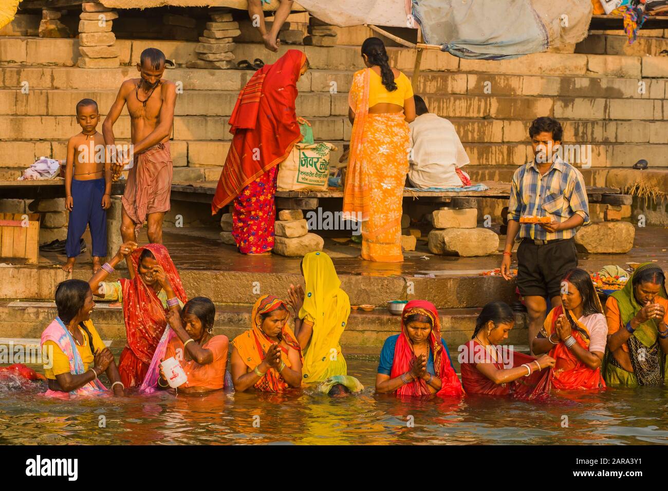 In the morning, Prayer at ghats of holy Ganges river, also Ganga river ...